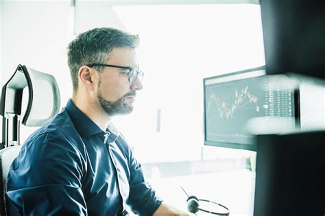 premium photo stock broker trading online watching charts and data