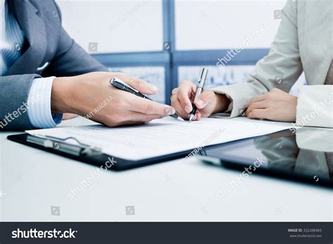Female Hand Signing Contract Stock Photo 332288483 Shutterstock