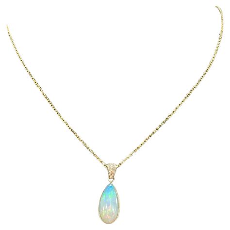 14k Yellow Gold Pear Opal And 07 Ct Diamond Pendant Necklace For Sale