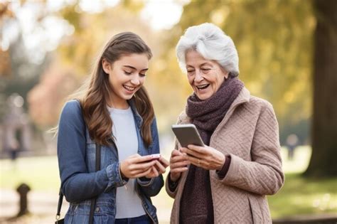 premium photo techsavvy generation bridging the digital divide in the park