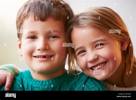 Indoor Portrait Of Brother And Sister Stock Photo Alamy