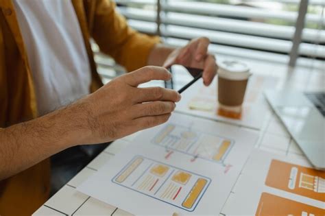 Premium Photo A Web Developer As A User Experience And User Interface Officer Is Analyzing