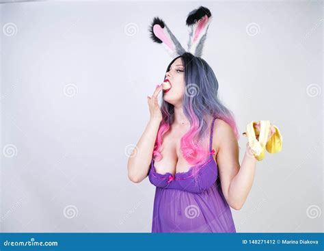 Erotic Caucasian Chubby Girl In A Transparent Lingerie Babydoll Dress With Rabbit Ears Enjoys