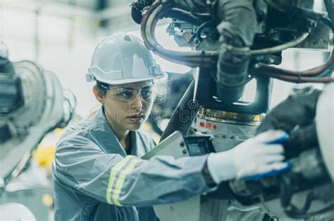 Engineer Working Machine Assembly In Advance Technology Robotic Factory Industry Service