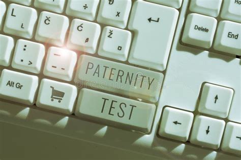 conceptual caption paternity test word written on a test of dna to