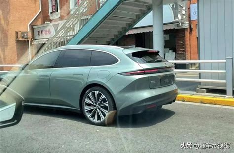 蔚来 Et5 猎装版实车曝光：极光绿涂装，有望 6 月亮相财经头条