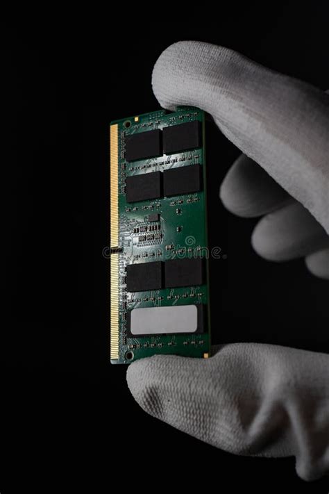 In The Darkness Hand Securely Grasping Ram Ddr4 Sodimm For Pc Stock Image Image Of Memory