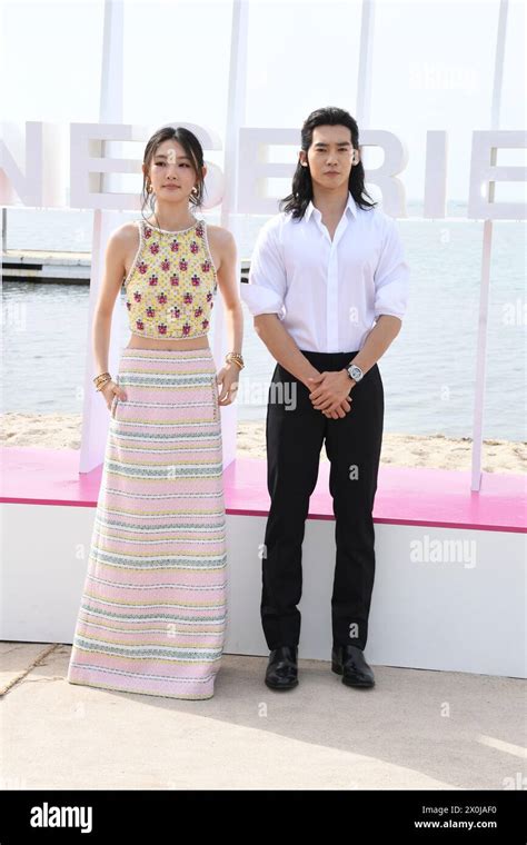 CANNES FRANCE APRIL Zhou Yiran And Yu Shi Yosh Yu Attend The To The Wonder Photocall