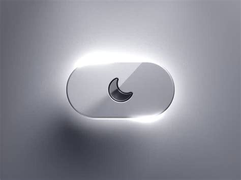 🌓 深色模式切換開關 這是一個從底部發出光線的 3d 按鈕，當被按下啟動時，按鈕會陷入一個凹槽，阻擋光線並將介面轉換為暗色模式；以