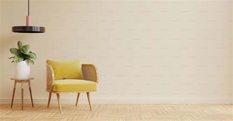 텅 빈 크림색 벽에 노란색 안락의자가 있는 현대적인 거실 인테리어3d 렌더링 사진 Unsplash의 실내 이미지