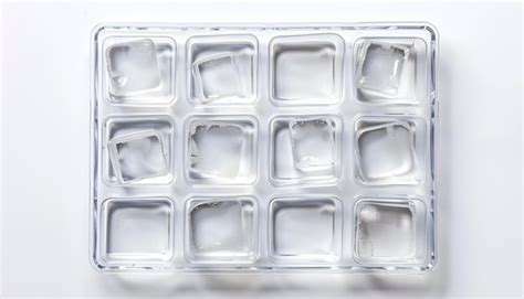 Empty Ice Cube Tray On White Background Top View Premium Ai Generated Image