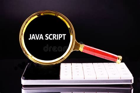 Javascript Under Magnifying Glass On A Sleek Keyboard Highlights Coding And Technology Stock