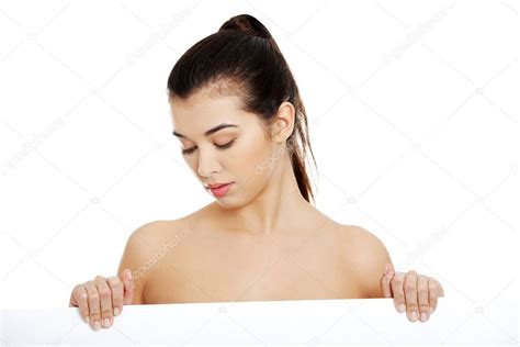 Sexy Naked Brunette Holding Empty Board Stock Photo Piotr Marcinski