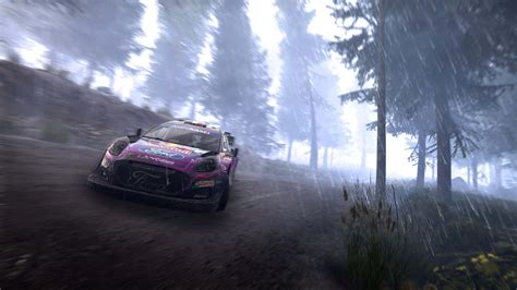 Download A Rally Car Driving Through The Forest