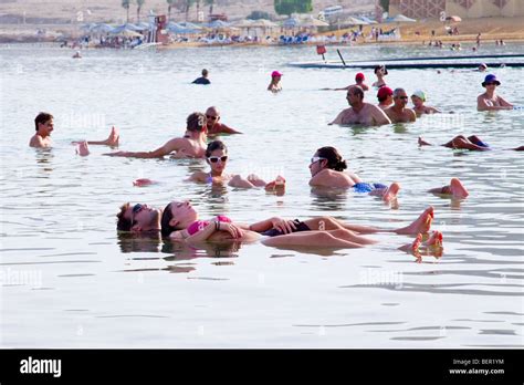 Israel Dead Sea People Float In The Heavy Water Of The Dead Sea Stock