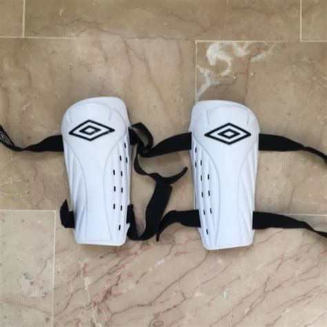 کمدا قیمت و خرید ساق بند فوتبال رنگ سفید