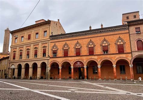 Bologna Architecture Of The Red City Lions In The Piazza
