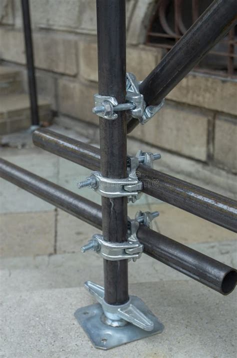 Three New Scaffold Double Fix Clamp And Scaffold Pipes For Build The Temporary Structure Stock