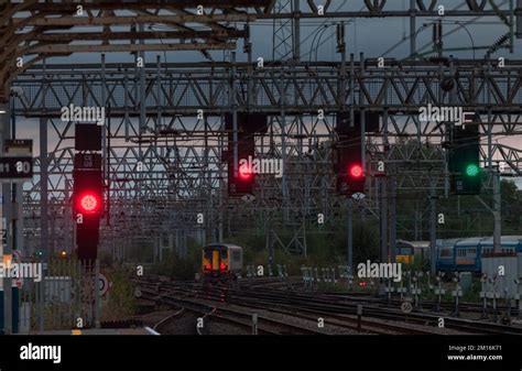 Transport For Wales Class 153 Sprinter Train Passing The Signal Gantry