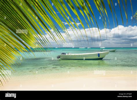 Beautiful Caribbean Sea And Boat On The Shore Of Exotic Tropical Island