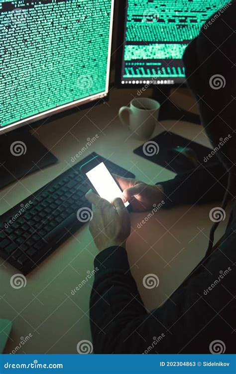Personal Information Vertical Photo Of Young Hacker In Black Hoodie