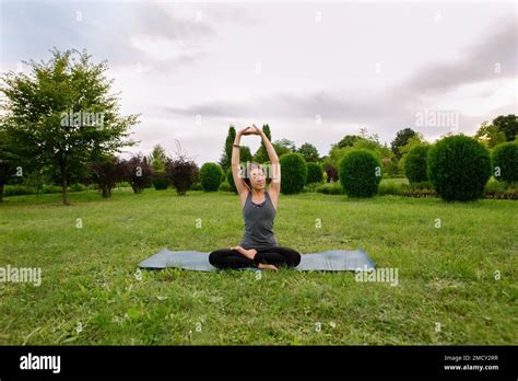 Caucasian Woman Yoga Instructor Doing Side Stretch Sitting Spine