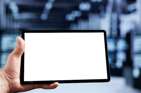 premium photo skilled it programmer using mock up tablet to check operational server clusters