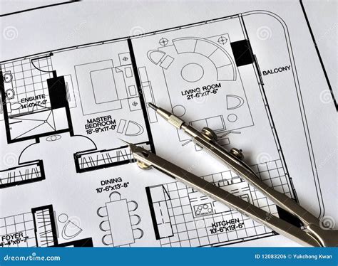 A Compass On The Top Of The Residence Floorplan Royalty Free Stock