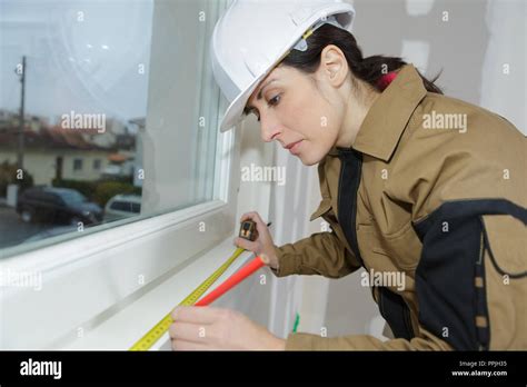 Woman Window Installer Stock Photo Alamy