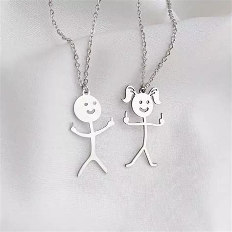 خرید و قیمت گردنبند ست دوستی بدبوی و بد گیرل استیل از غرفه تولیدی و پخش زیور آلات مردانه و زنانه