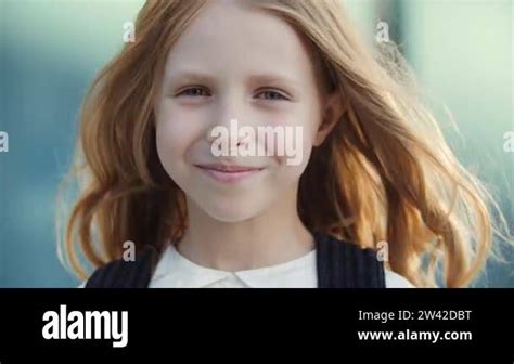Portrait Little Happy Cute Blonde School Girl With Blue Eyes Looks
