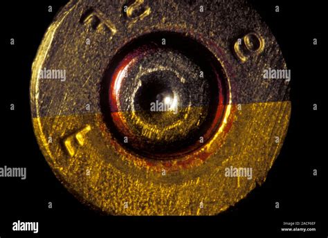 Forensic Ballistics Test Bullet Cartridges Being Compared Under A Microscope One Half Of The