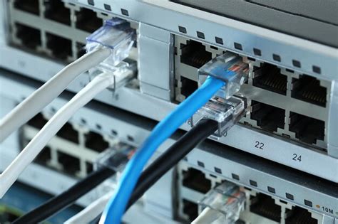 Premium Photo Ethernet Cables Connected To Network Switch Close Up