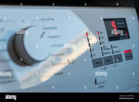 detail view of washing machine control panel with contemporary