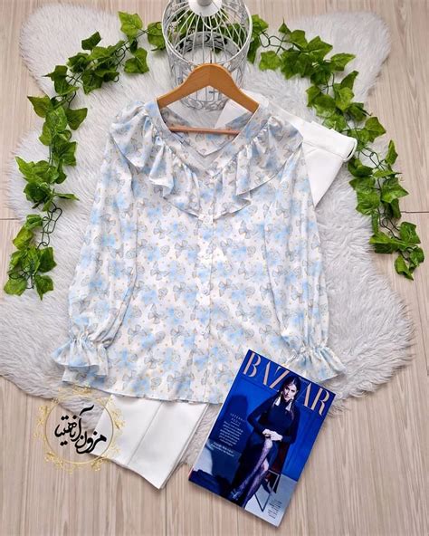 شومیز یقه خورشیدی سفید طرح پروانه آبی آسمانی پرگل