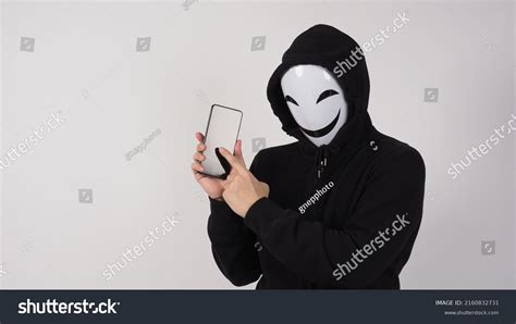 Anonymous Hacker Face Mask Smartphone Hand Stock Photo 2160832731 Shutterstock