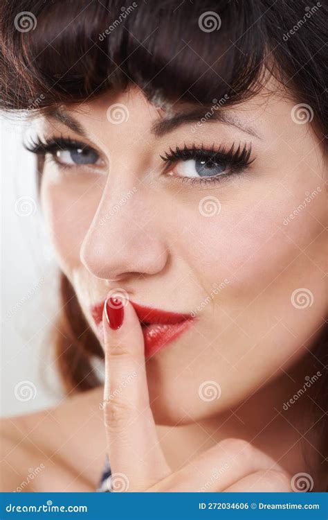 Lets Keep This Between Uscropped View Of A Sultry Woman With Her