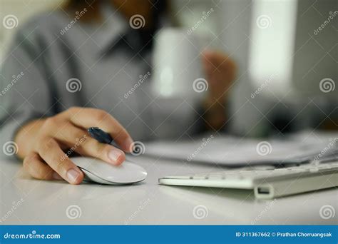 Close Up Of Female Office Worker Using Computer Mouse On Desk Stock Photo Image Of Consulting