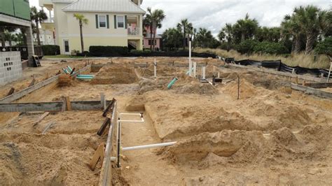 Rough Plumbing And Concrete Form Boards Set Up For Footer Inspection