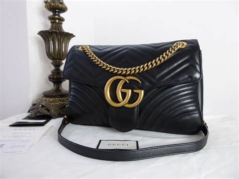 Gucci Gg Marmont Medium Shoulder Bag In Black Matelassé Calfskin Sold