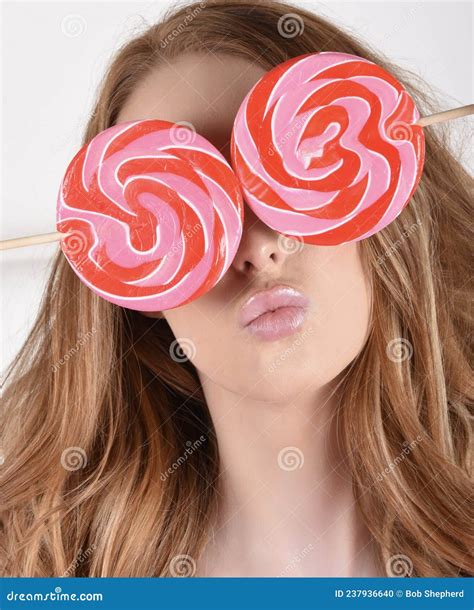 Beautiful Tall Slim Redhead Model In Pretty Pink Lingerie With Candy Stock Photo Image Of