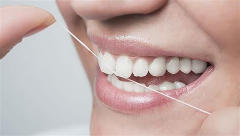 Flossing The Right Way Excellence In Dentistry Cosmetic Dentists