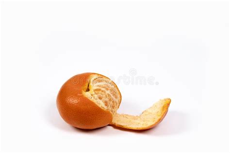 Freshly Peeled Orange Showcases Bright Segments On A Clean Surface