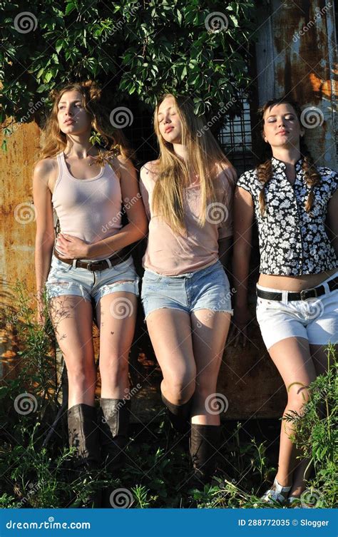 Portrait Of Three Tired Girls On Rustic Background Stock Image Image
