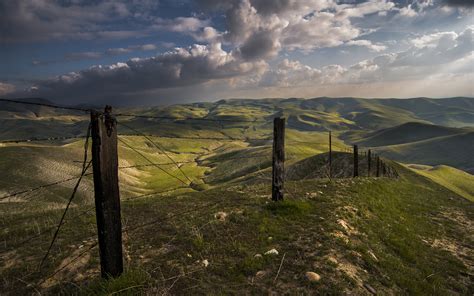 Fence Barb Wire Grass Landscape Clouds Hills Mountains Sky
