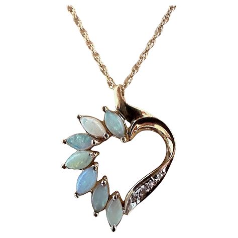 Antique 14k Yellow Gold Heart Opal Heart Halo Diamond Pendant For Sale