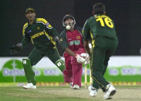 Dion Ebrahim C Watches A Ball Delivered By Danish Kaneria R