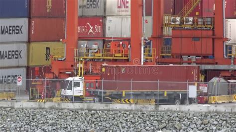 A Truck Trailer In The Process Of Transporting And Maneuvering An