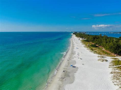 Premium Photo Aerial View Of Coquina Beach With White Sand Beach And