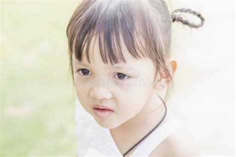 Portrait Of A Young Asian Girl Smiling At The Camera Happy Thai Girl